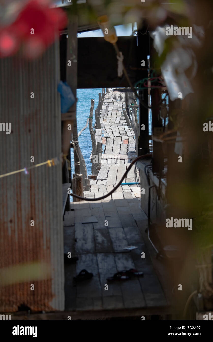 Wooden doorway open to a jetty on the sea Stock Photo - Alamy