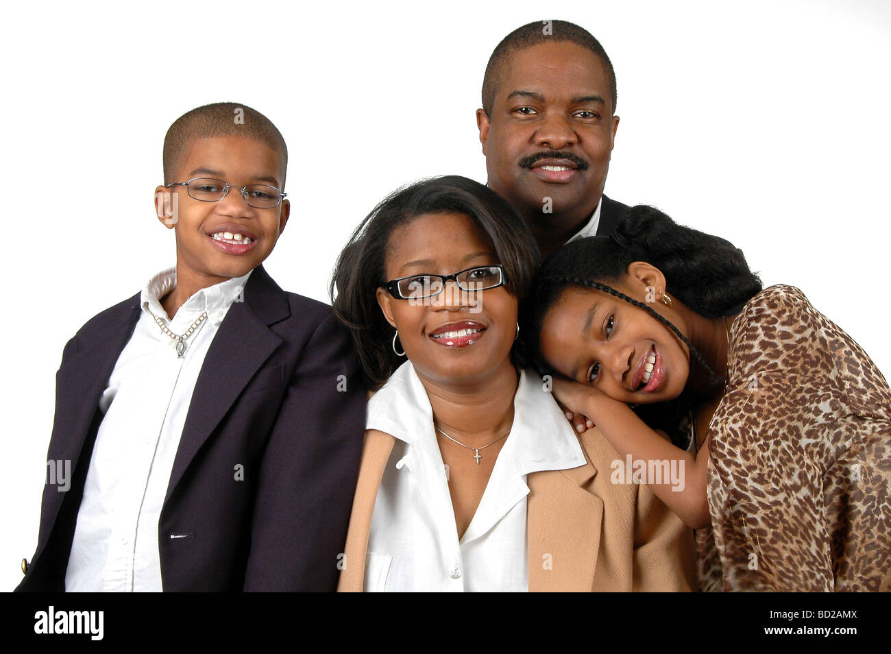 Family with formal attire over a white background Stock Photo - Alamy
