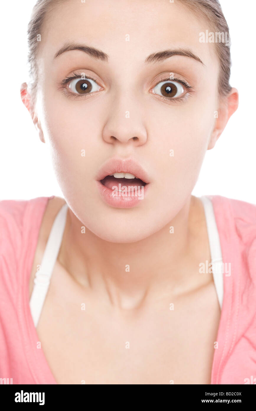 Young woman shocked Stock Photo - Alamy