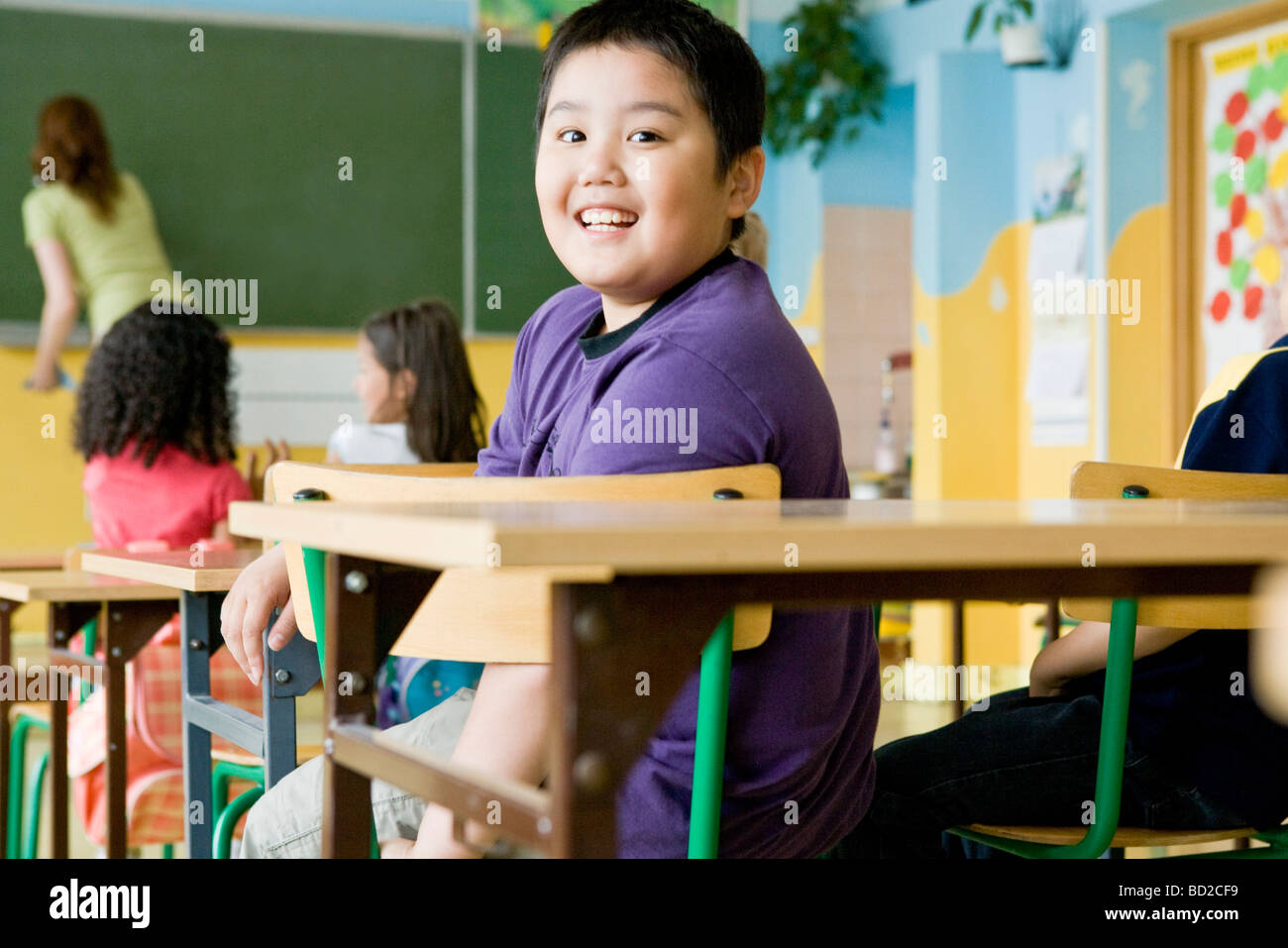 Children at school during lesson Stock Photo - Alamy