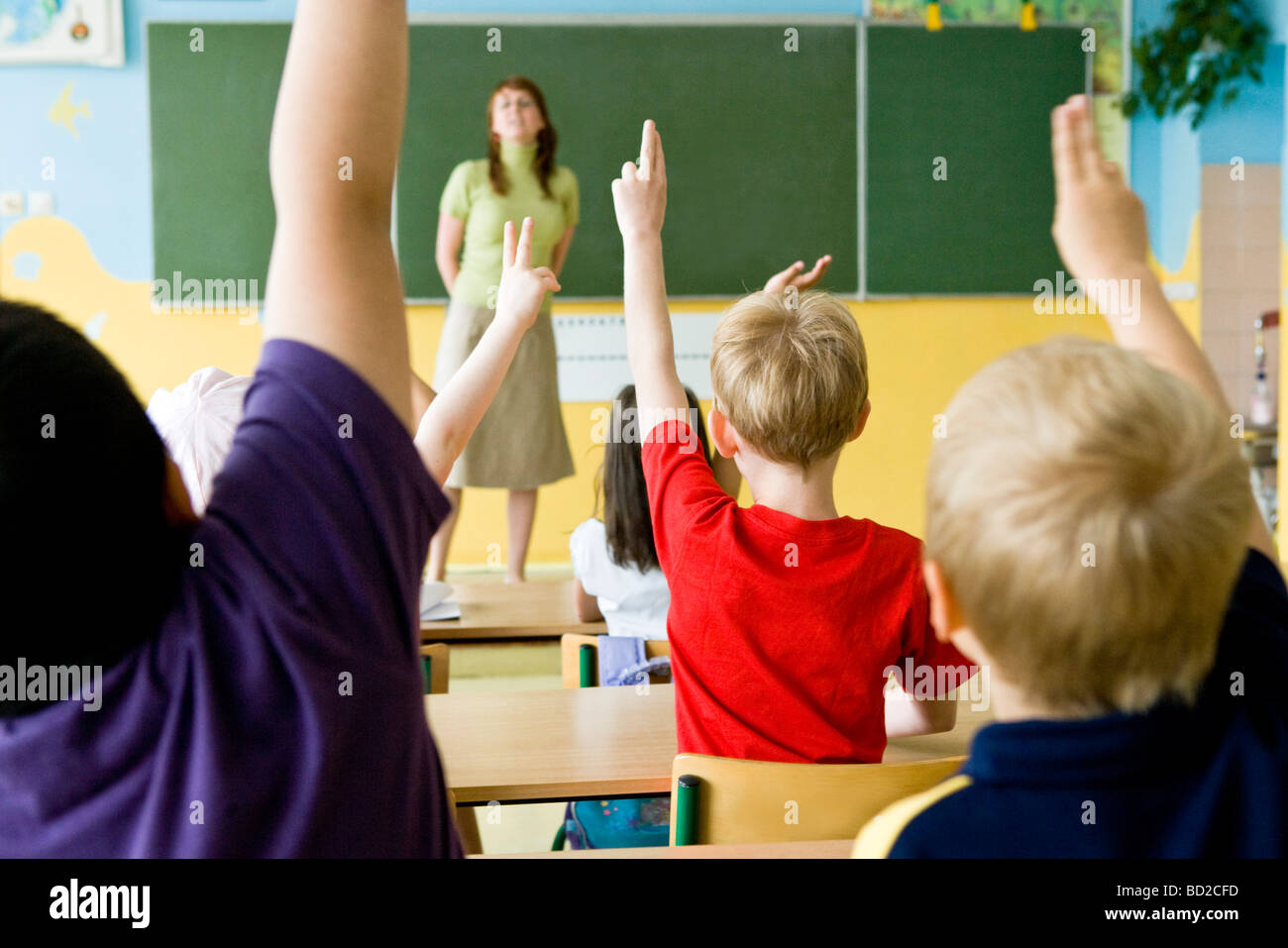 Children at school during lesson Stock Photo - Alamy