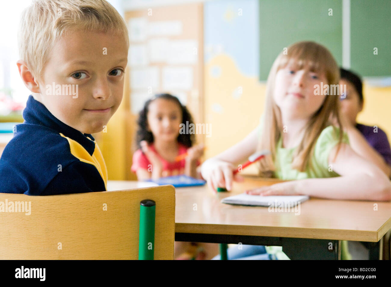 Children studying at school Stock Photo - Alamy
