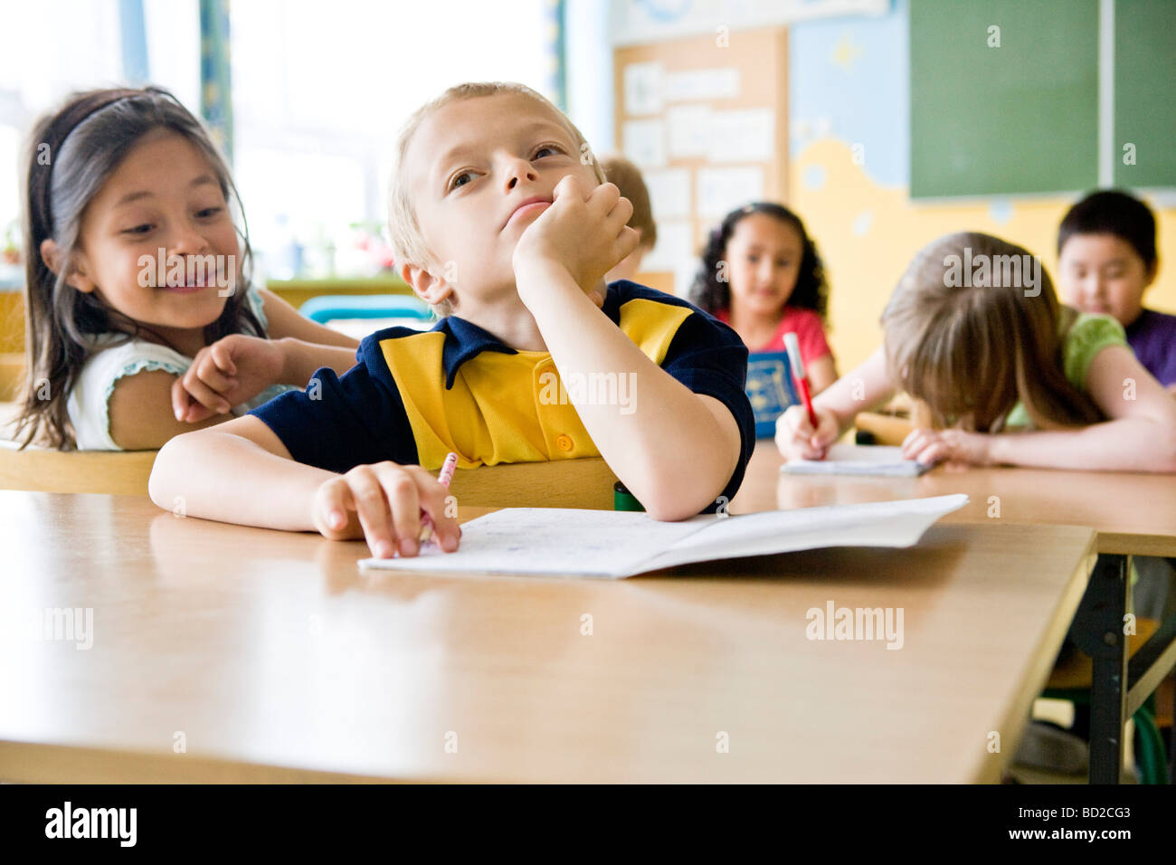 Children studying at school Stock Photo - Alamy