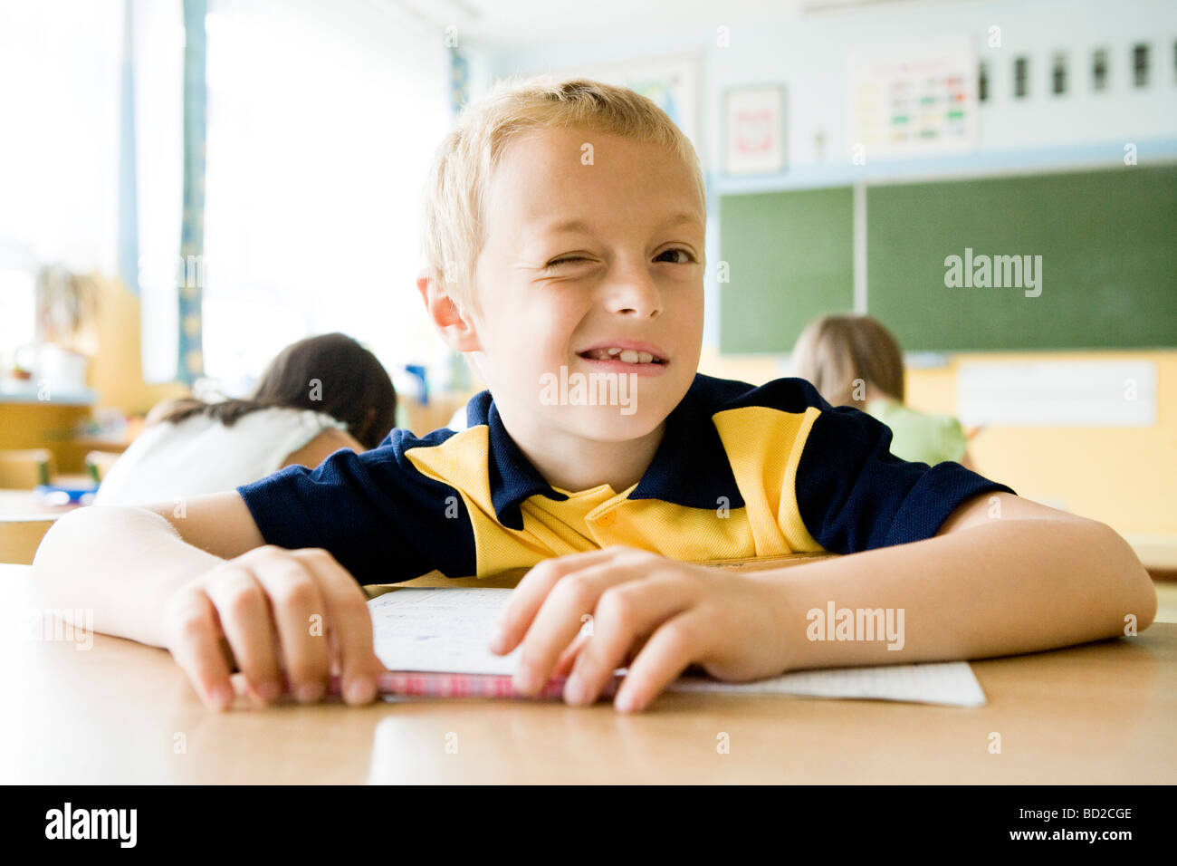 Boy studying at school Stock Photo - Alamy