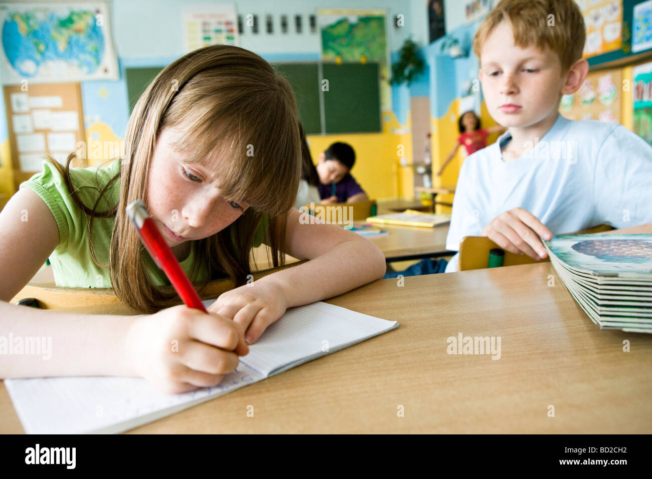 Children studying at school Stock Photo - Alamy