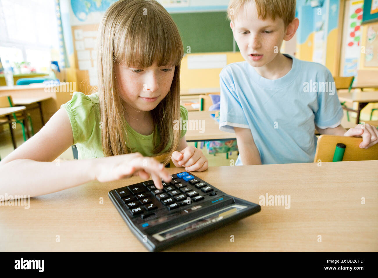 Children studying in school Stock Photo - Alamy