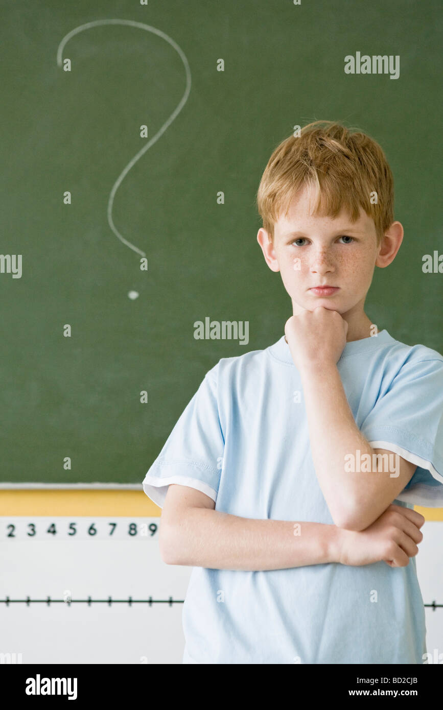 boy looking for answer at school Stock Photo - Alamy