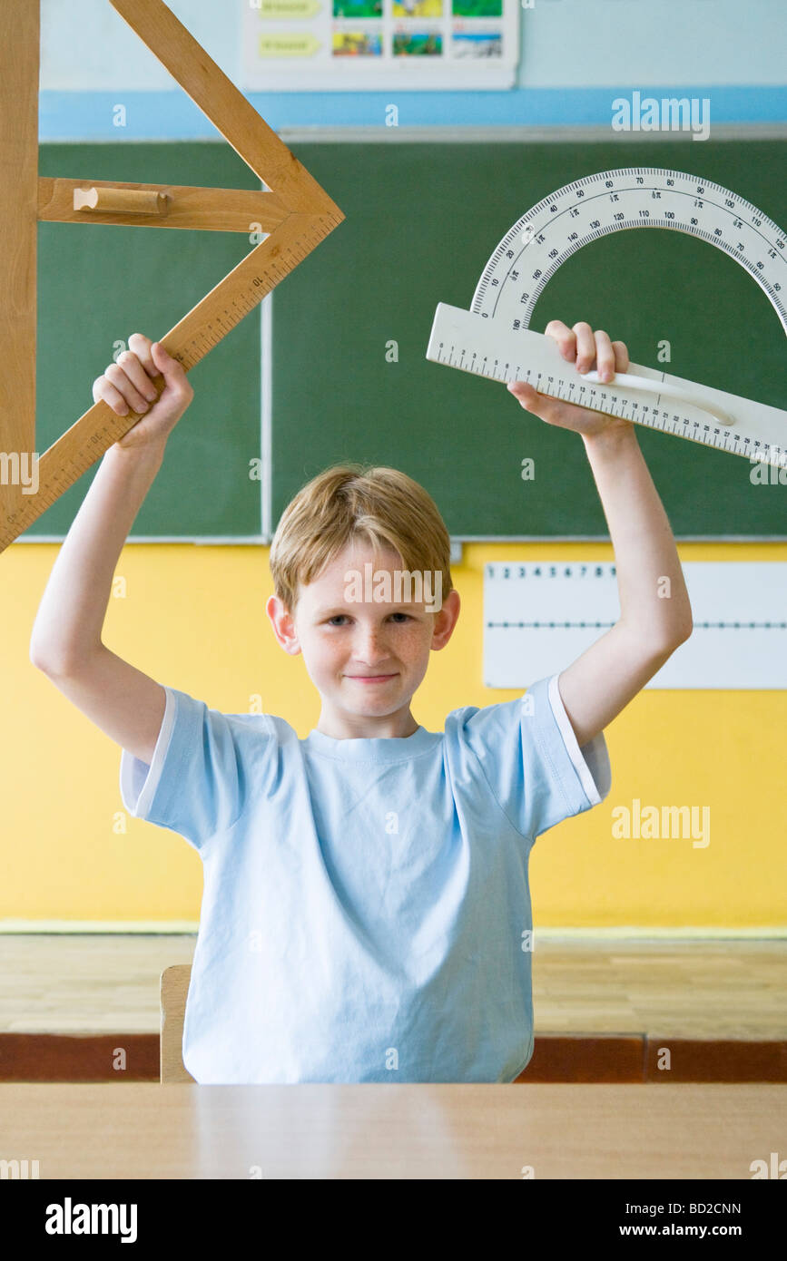 portrait of a boy with set square Stock Photo - Alamy