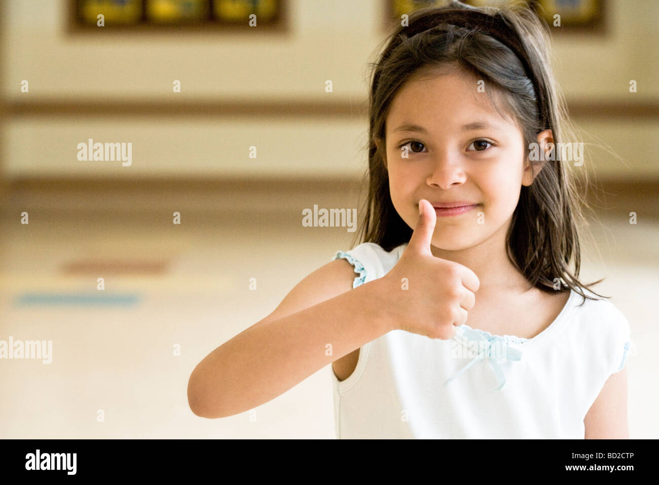 portrait of a girl in school corridor Stock Photo - Alamy