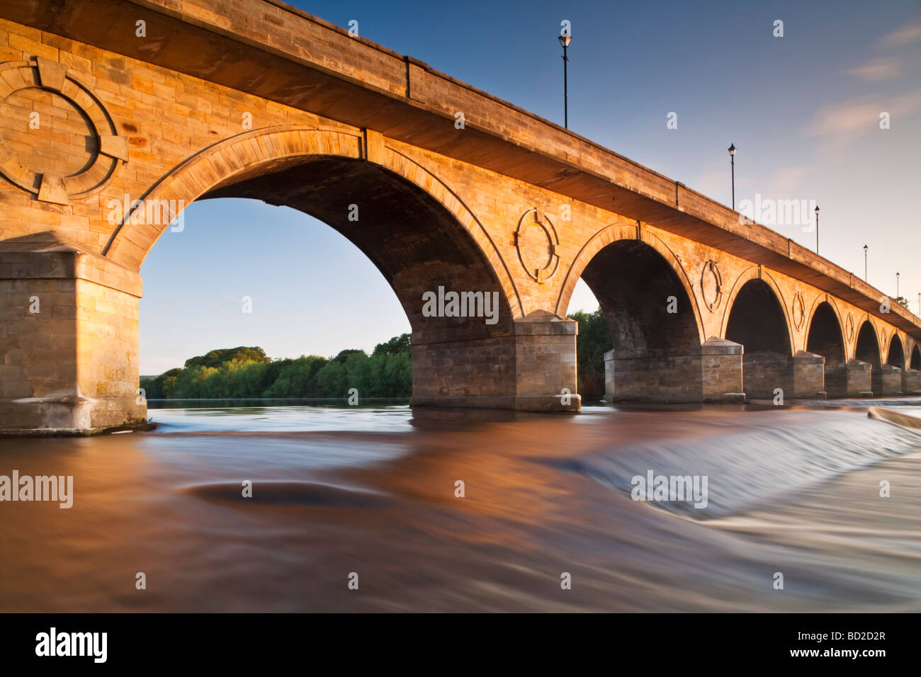 Hexham Bridge over the River Tyne lit by early morning summer light ...