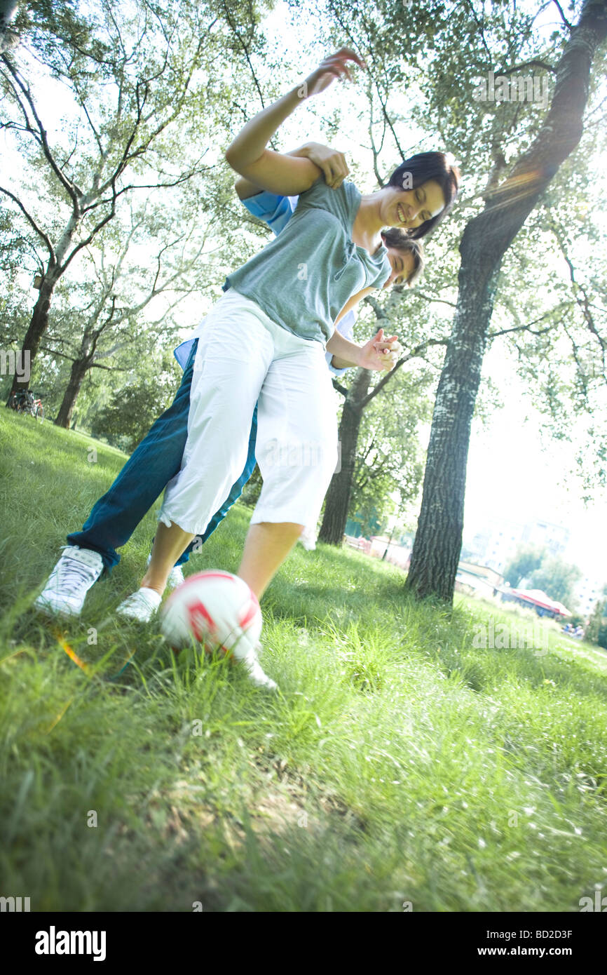 People play football on grass hi-res stock photography and images - Alamy