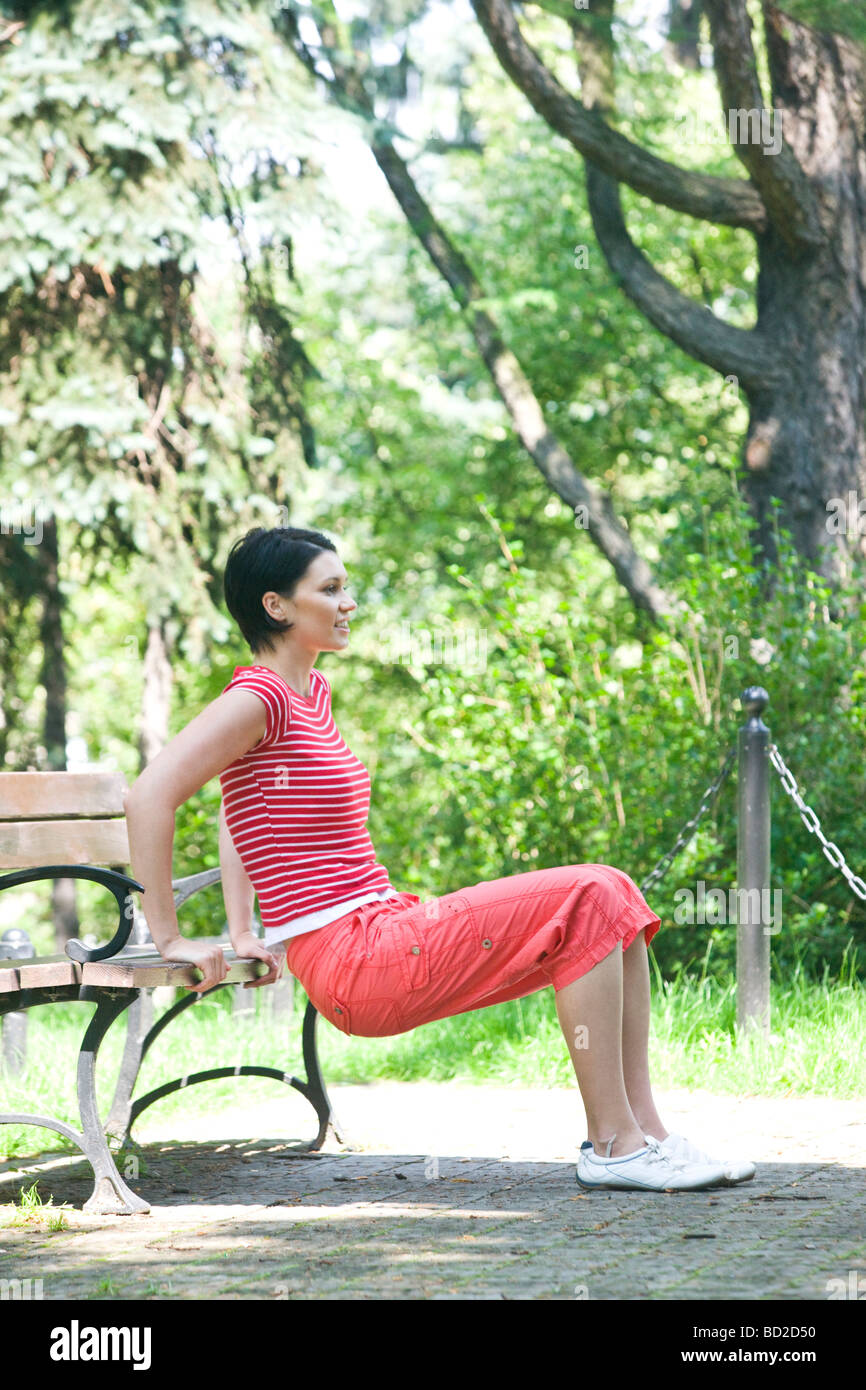 woman exercising in park Stock Photo - Alamy