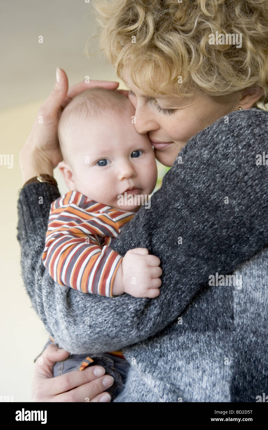 Mother hugging little baby boy Stock Photo - Alamy