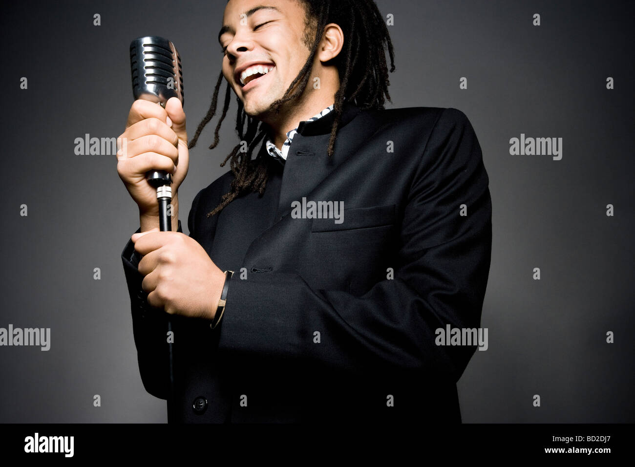 man smiling with mic Stock Photo - Alamy