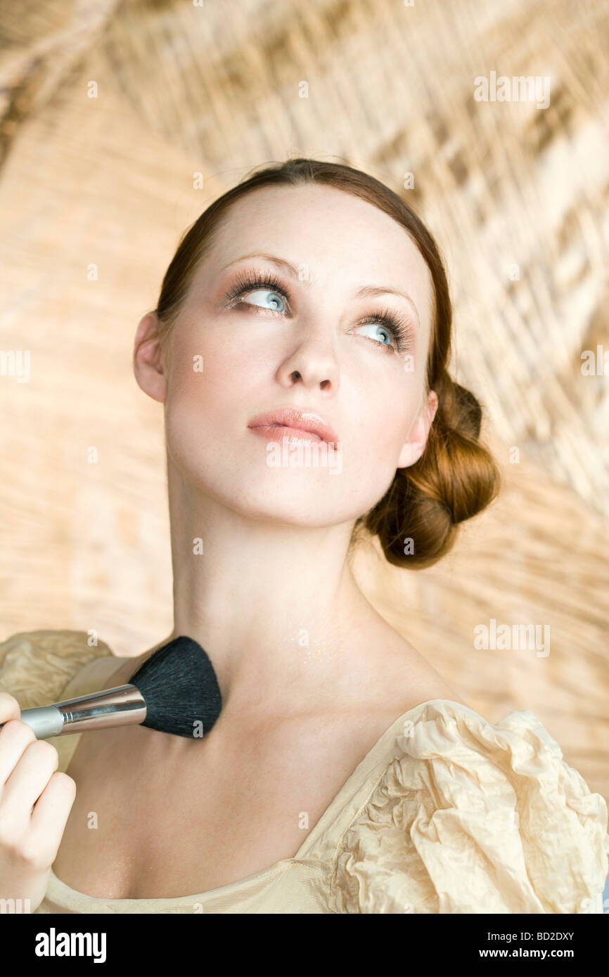Beauty cosmetics young woman hair up bun hi-res stock photography and ...