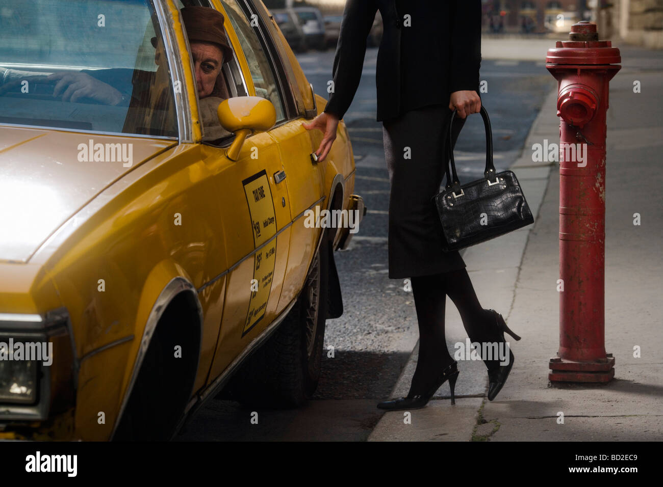 Taxi Driver picking up client Stock Photo - Alamy