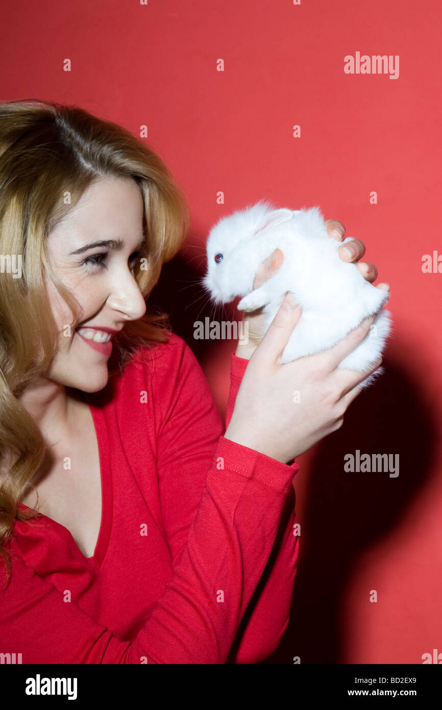 young woman with rabbit Stock Photo - Alamy