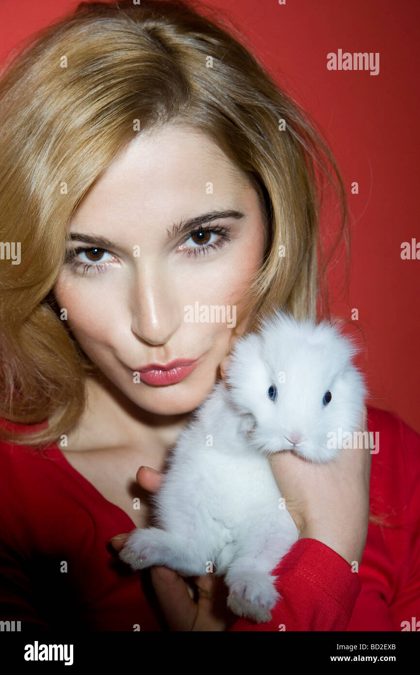 young woman with rabbit Stock Photo - Alamy