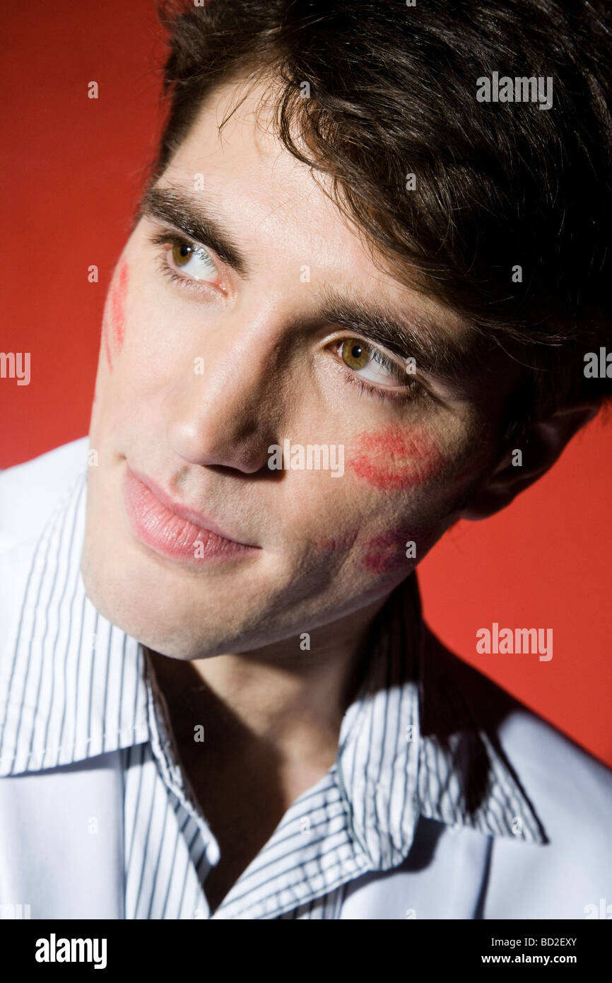 man with lipstick on cheek Stock Photo - Alamy