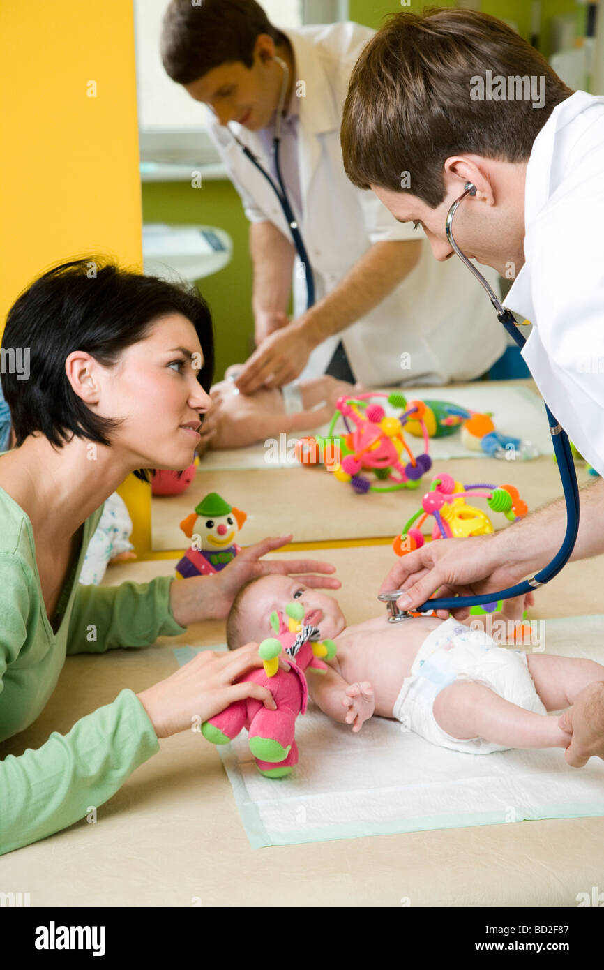 Mum baby talking doctor hi-res stock photography and images - Alamy