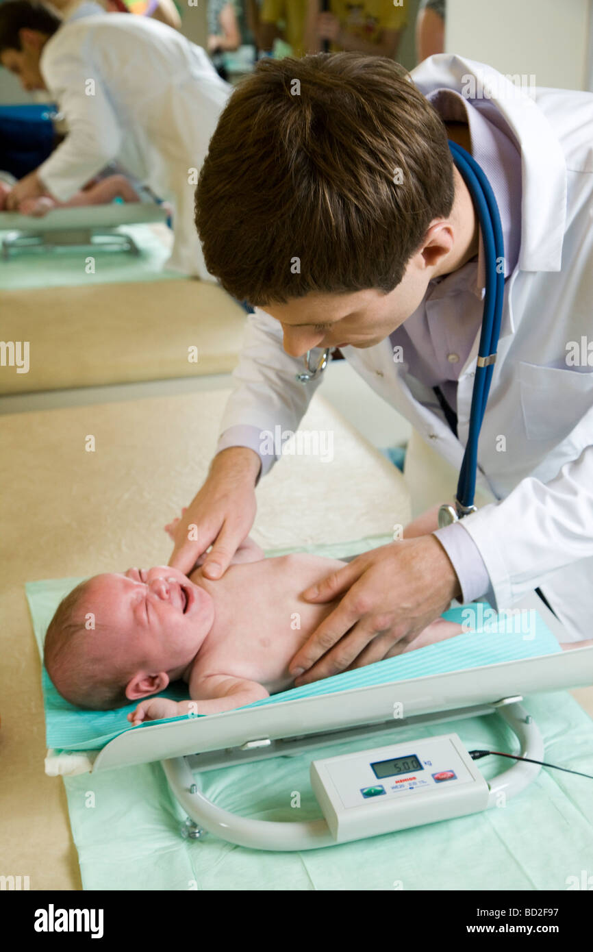 Child weighing scale clinic hi-res stock photography and images - Alamy
