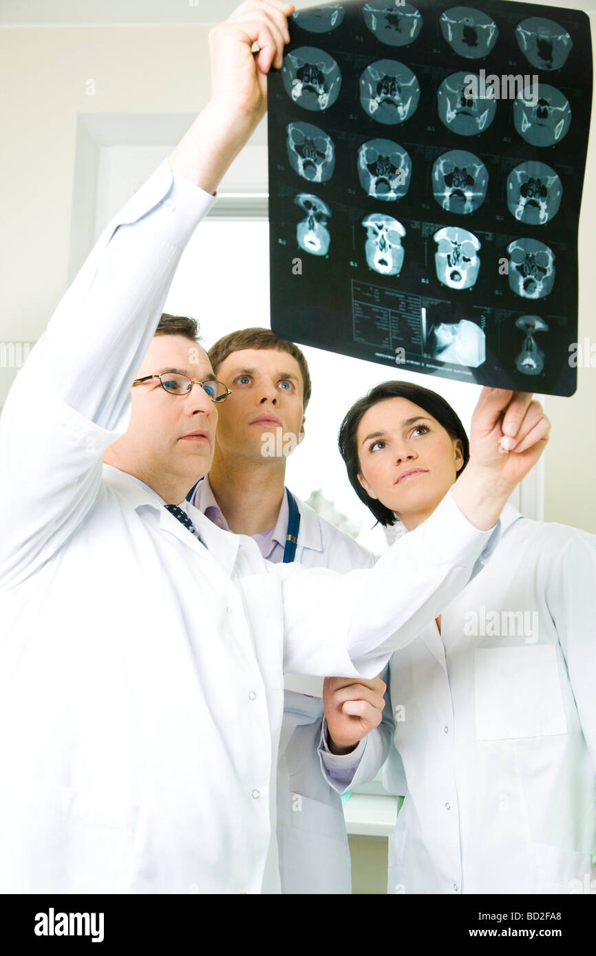 doctors looking at x-ray picture Stock Photo - Alamy