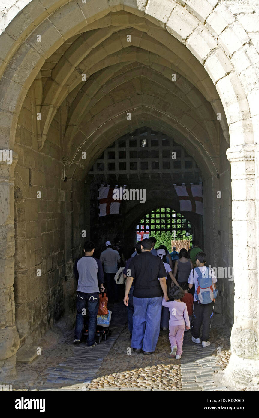 Entrance to Warwick Castle is through the gatehouse and guarded by two ...