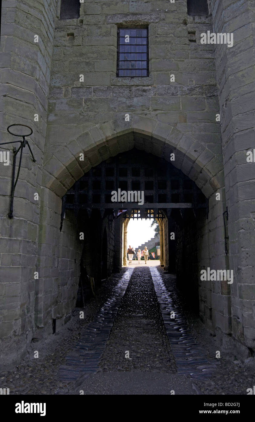 Entrance to Warwick Castle is through the gatehouse and guarded by two ...
