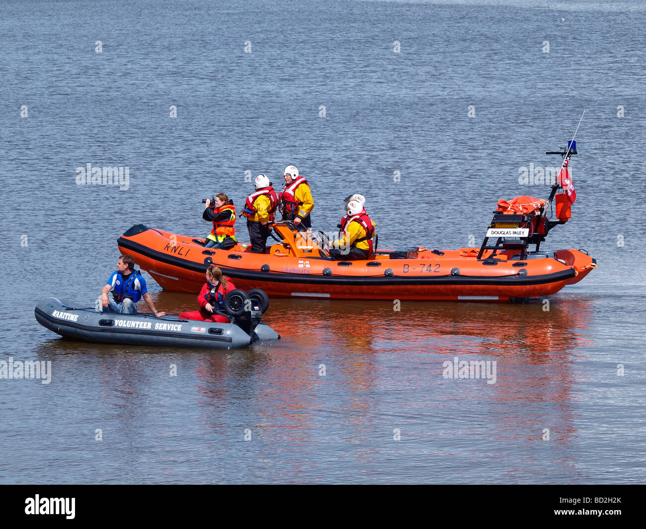 RNLI inshore lifeboat and the Maritime Volunteer service boat Stock ...