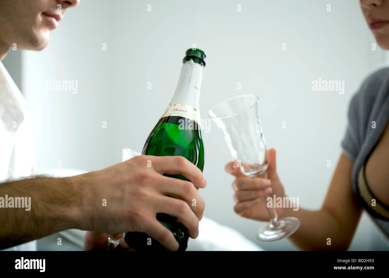couple drinking champagne Stock Photo - Alamy