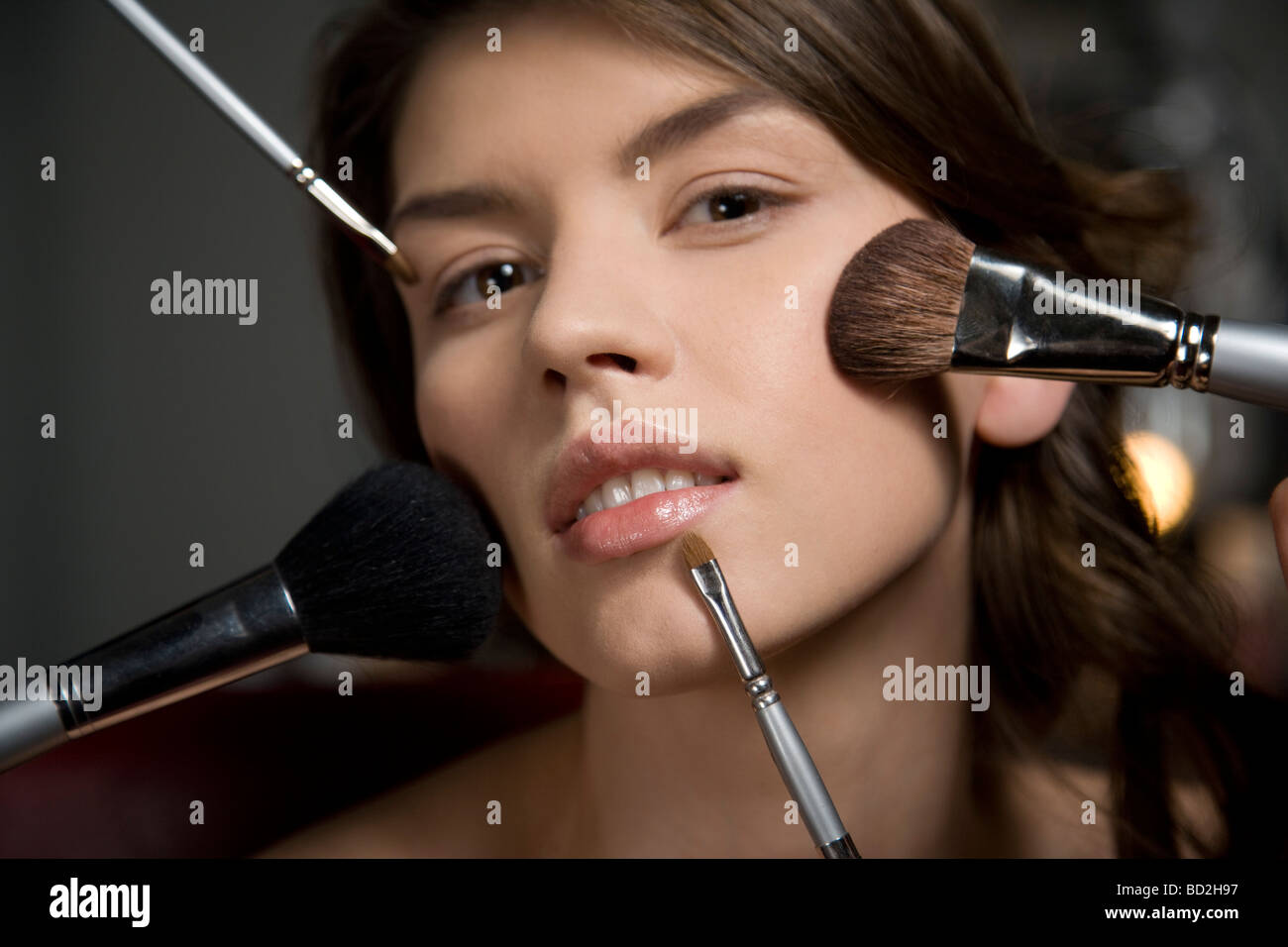 woman with various† make up brushes Stock Photo - Alamy
