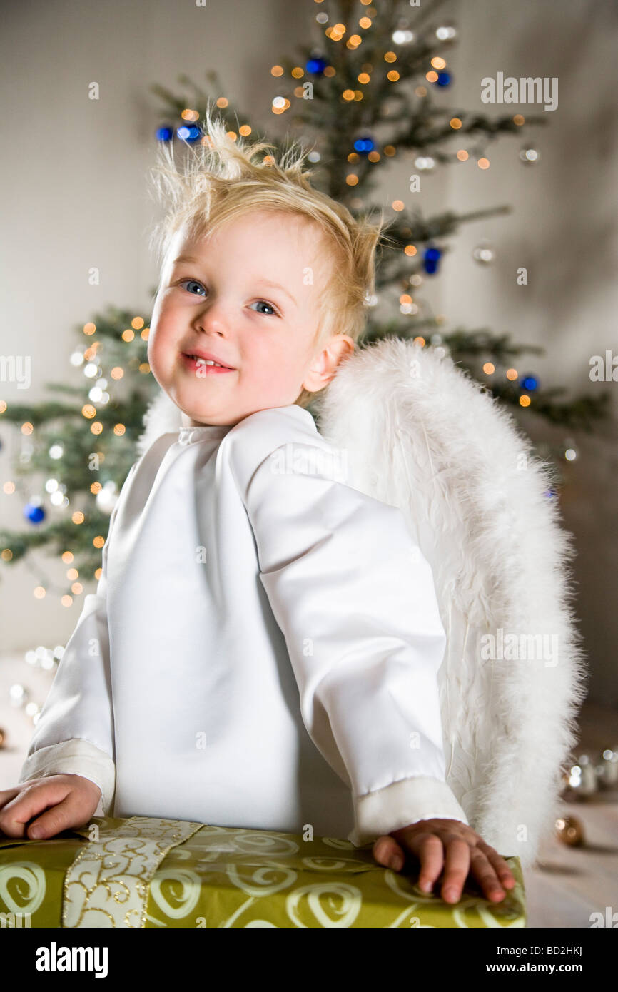 toddler boy wearing angel suit Stock Photo - Alamy