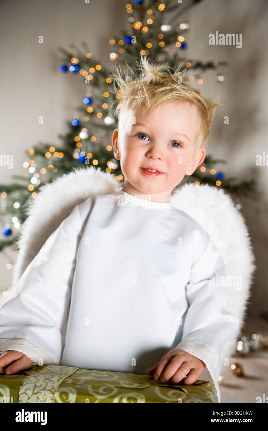 toddler boy wearing angel suit Stock Photo - Alamy