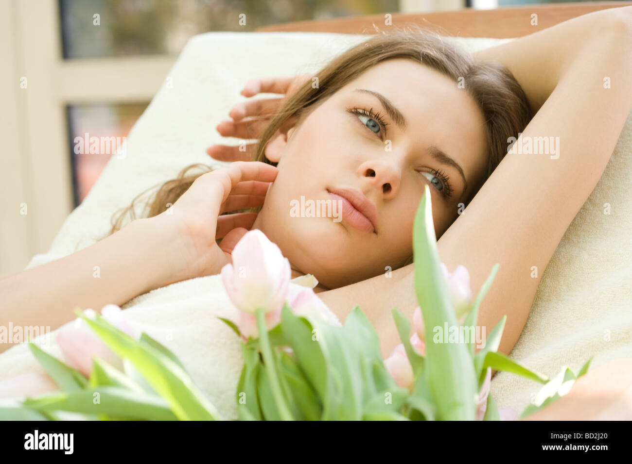 young woman relaxing Stock Photo - Alamy