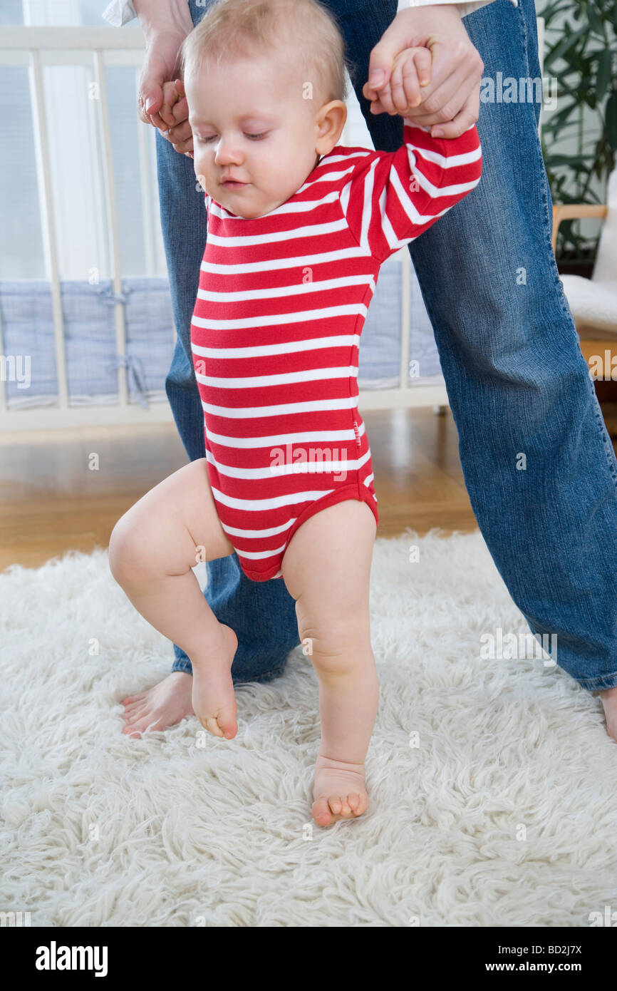 baby trying to walk Stock Photo - Alamy