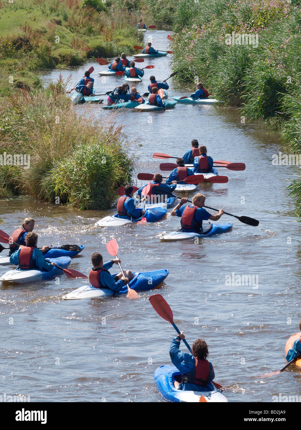Children learning to canoe Stock Photo - Alamy