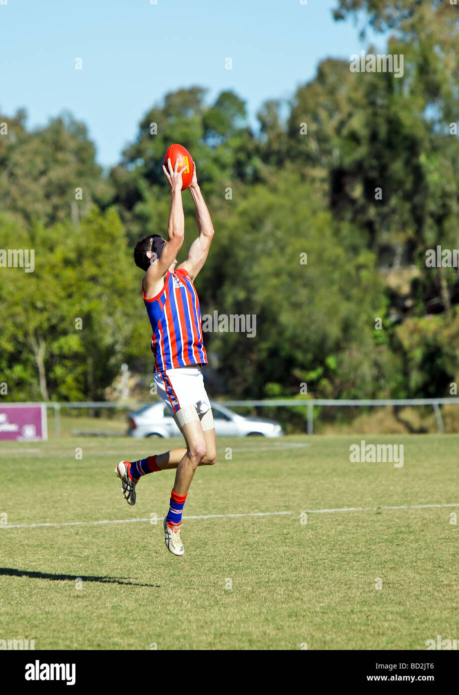 Australian rules football being played hi-res stock photography and ...