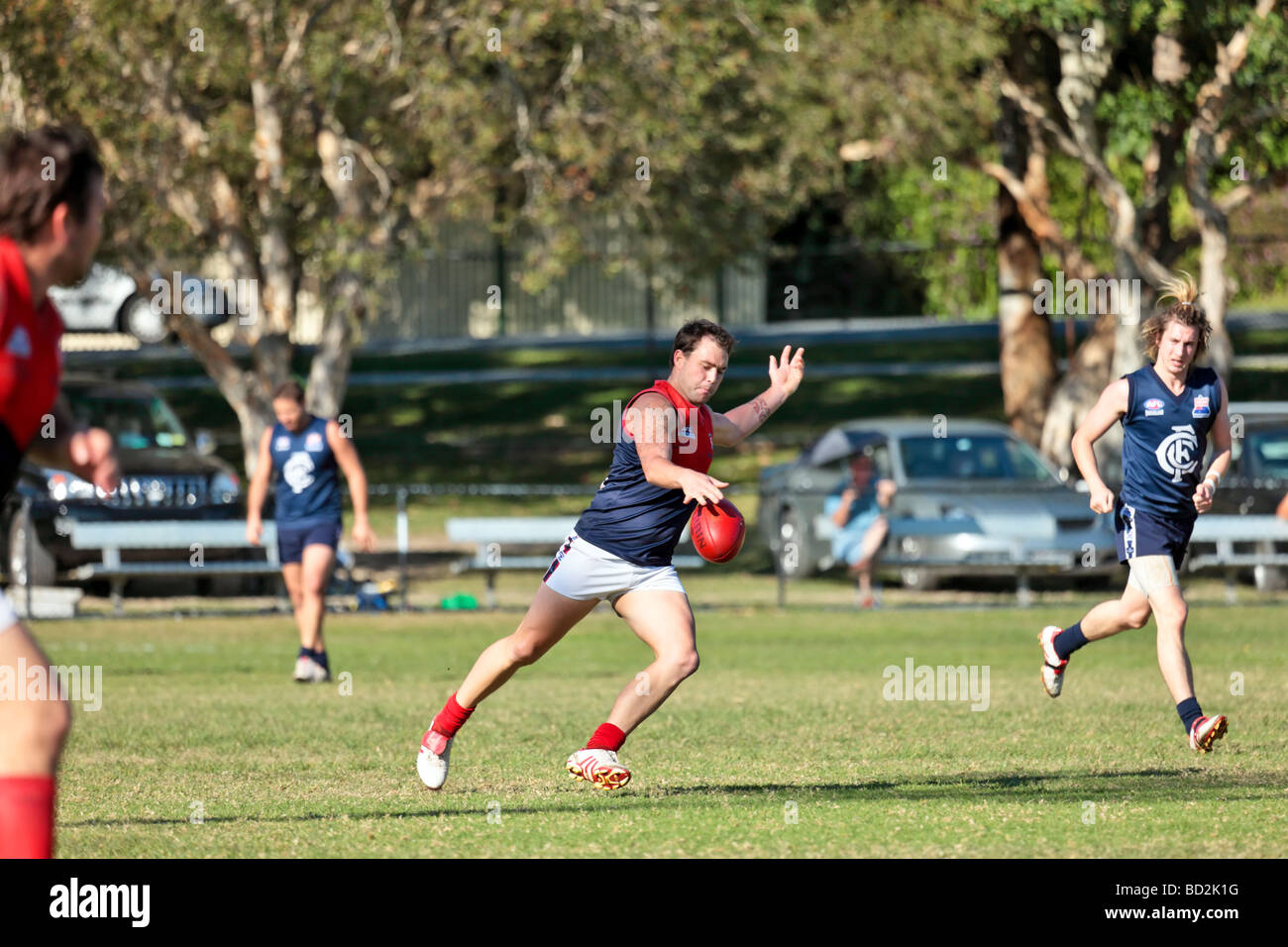 Australian Rules Football being played by two teams in a competition ...