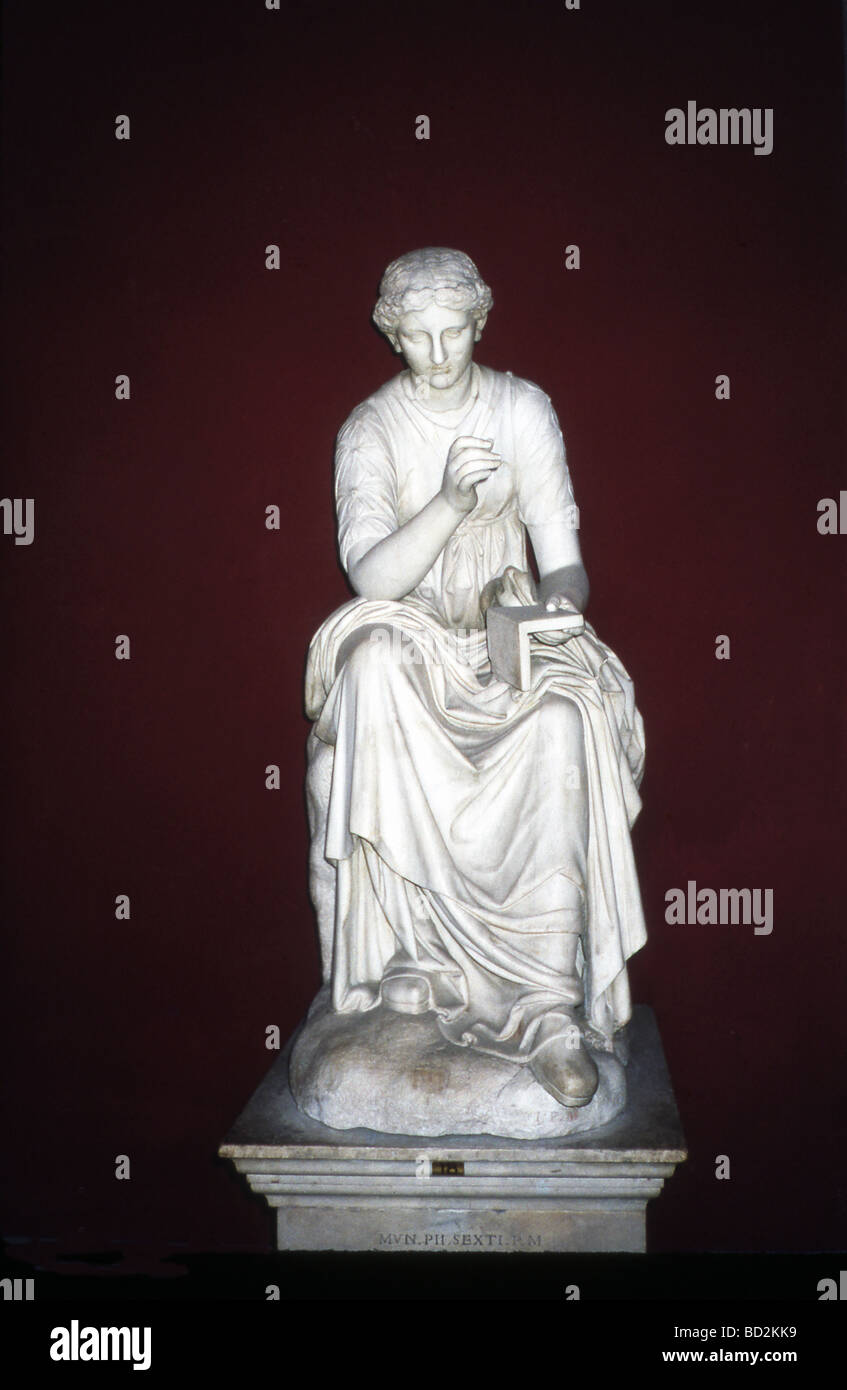 This sculpture shows the Greek Muse Calliope seated and holding a wax ...
