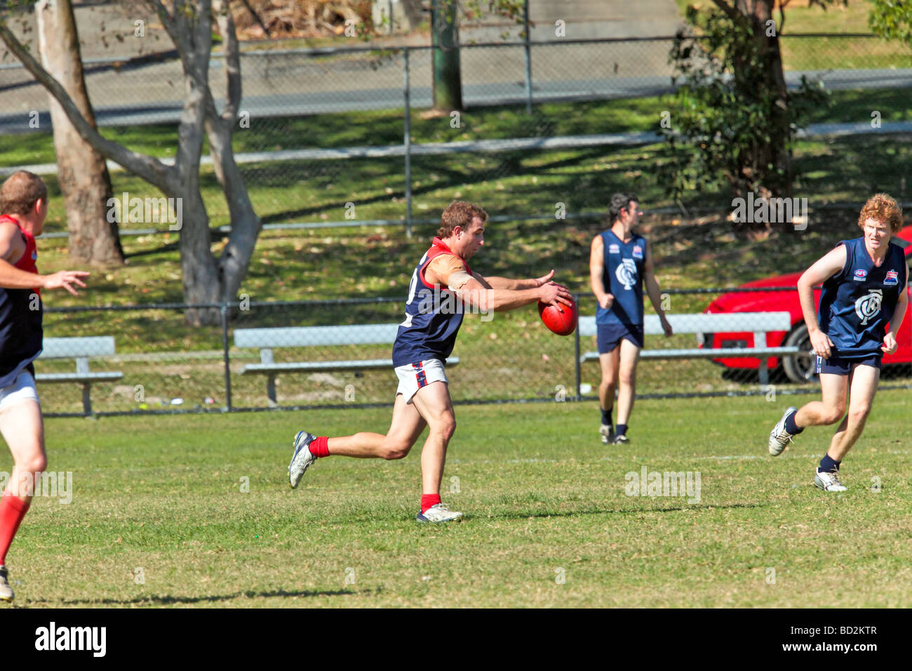Australian rules football being played hi-res stock photography and ...