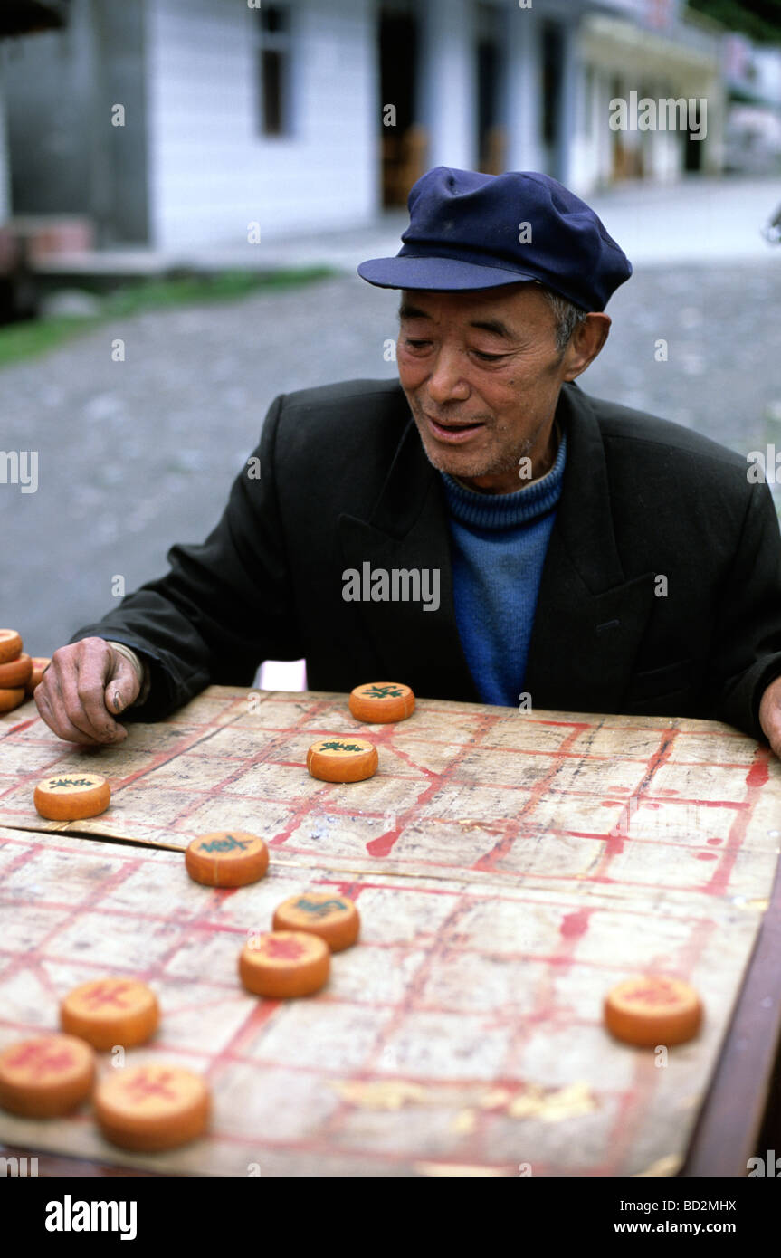 Chinese villager playing chess in Wolong,Sichuan,China Stock Photo - Alamy