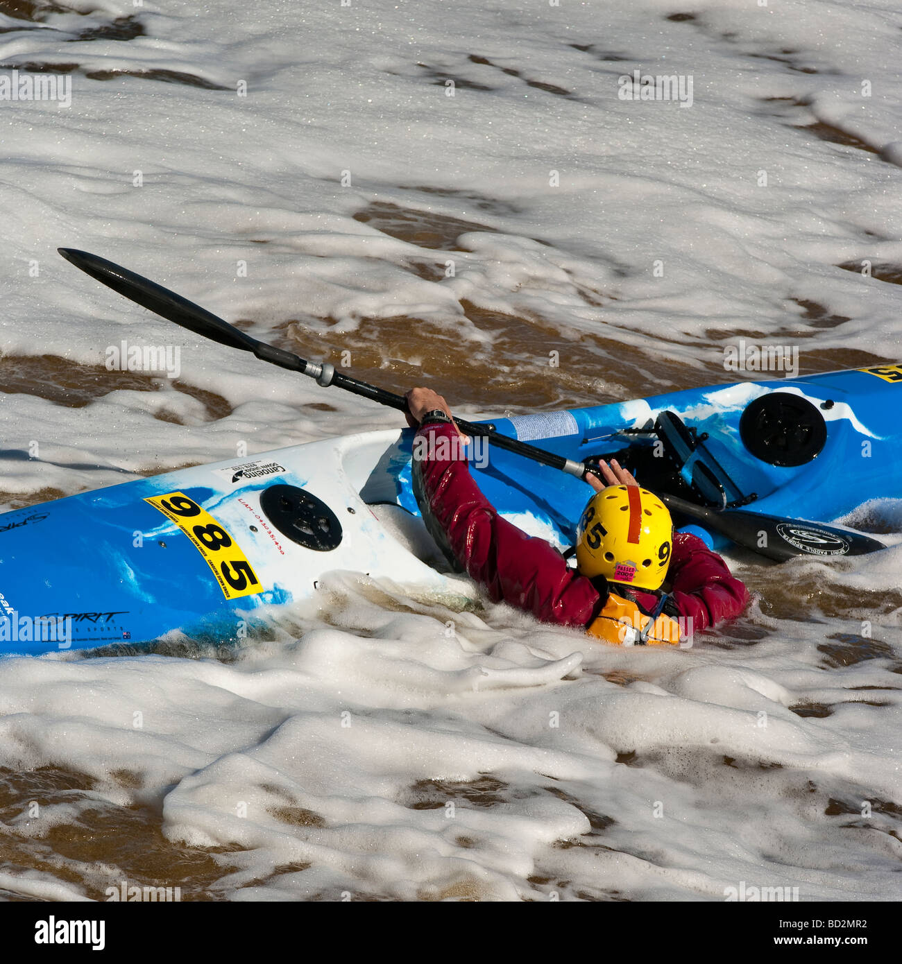 Overturned kayak while shooting the rapids at the Avon Descent ...