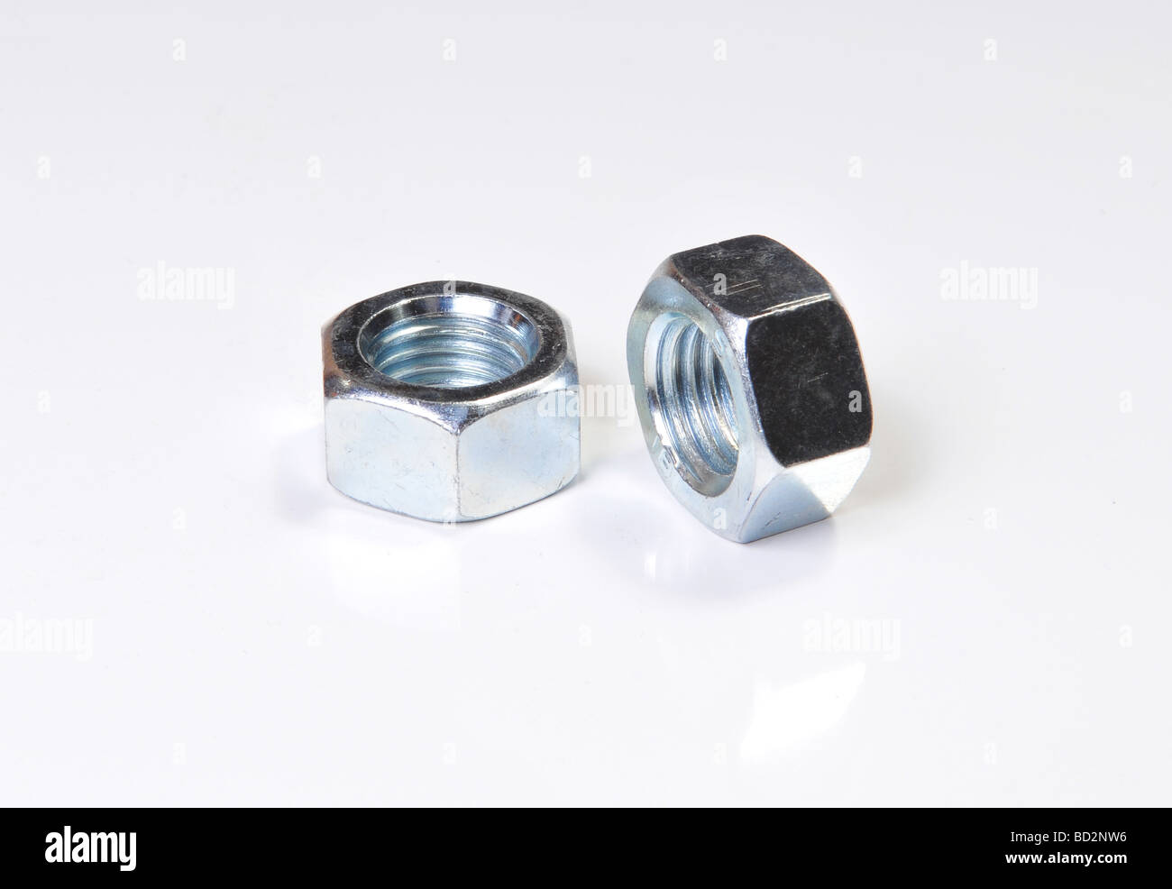 Pair of nuts on white background Stock Photo - Alamy