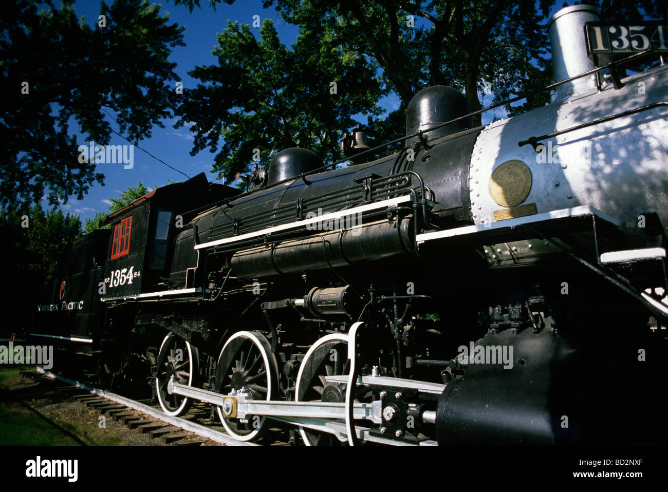 Northern Pacific Railroad historic engine on display in a downtown park ...