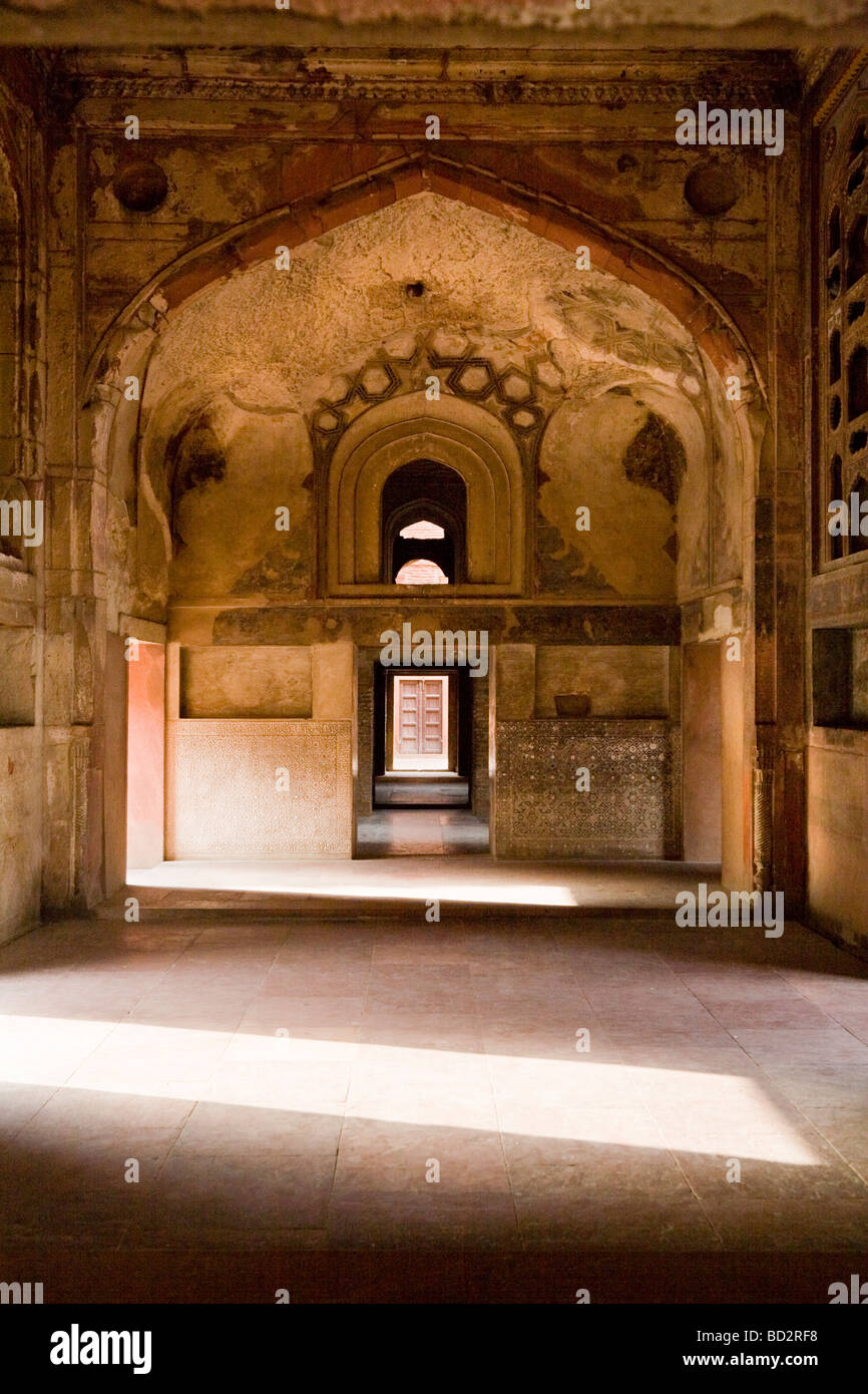 Stone muslim style arch and decorated stone ceiling of a walkway in ...