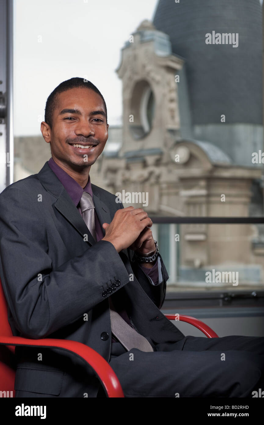 Man seated at window, Paris Stock Photo - Alamy