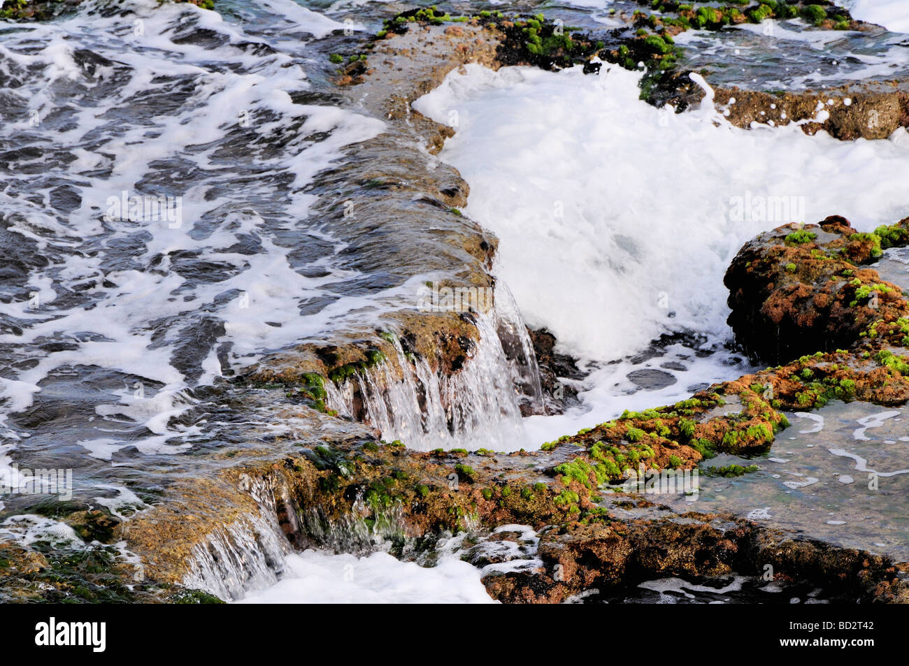 Rock in sea waves hi-res stock photography and images - Alamy