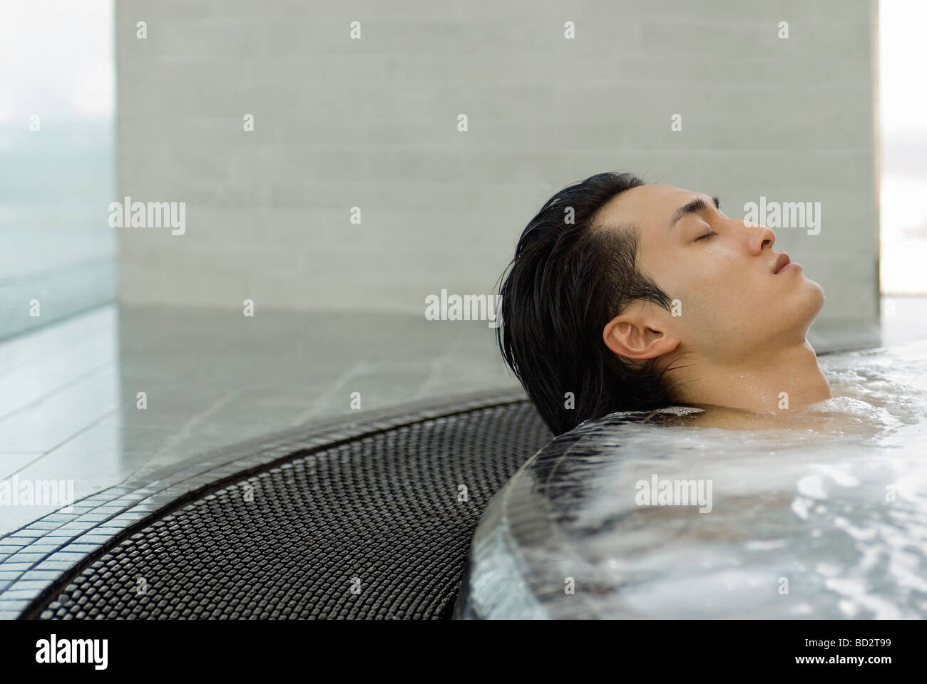 Young Man In Hot Tub High Resolution Stock Photography and Images - Alamy