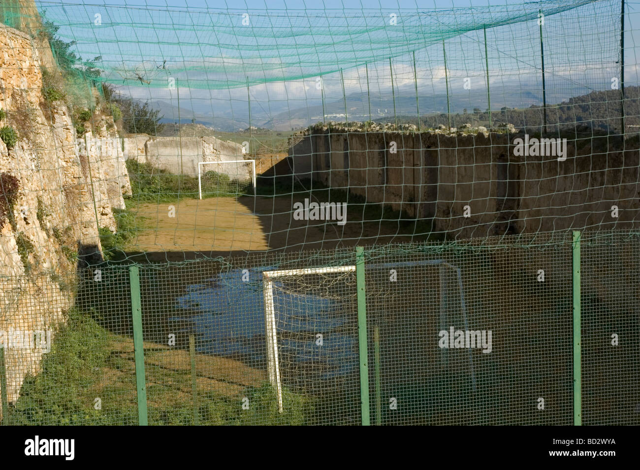 football pitch inside the ruins of an ancient castle or church of ...