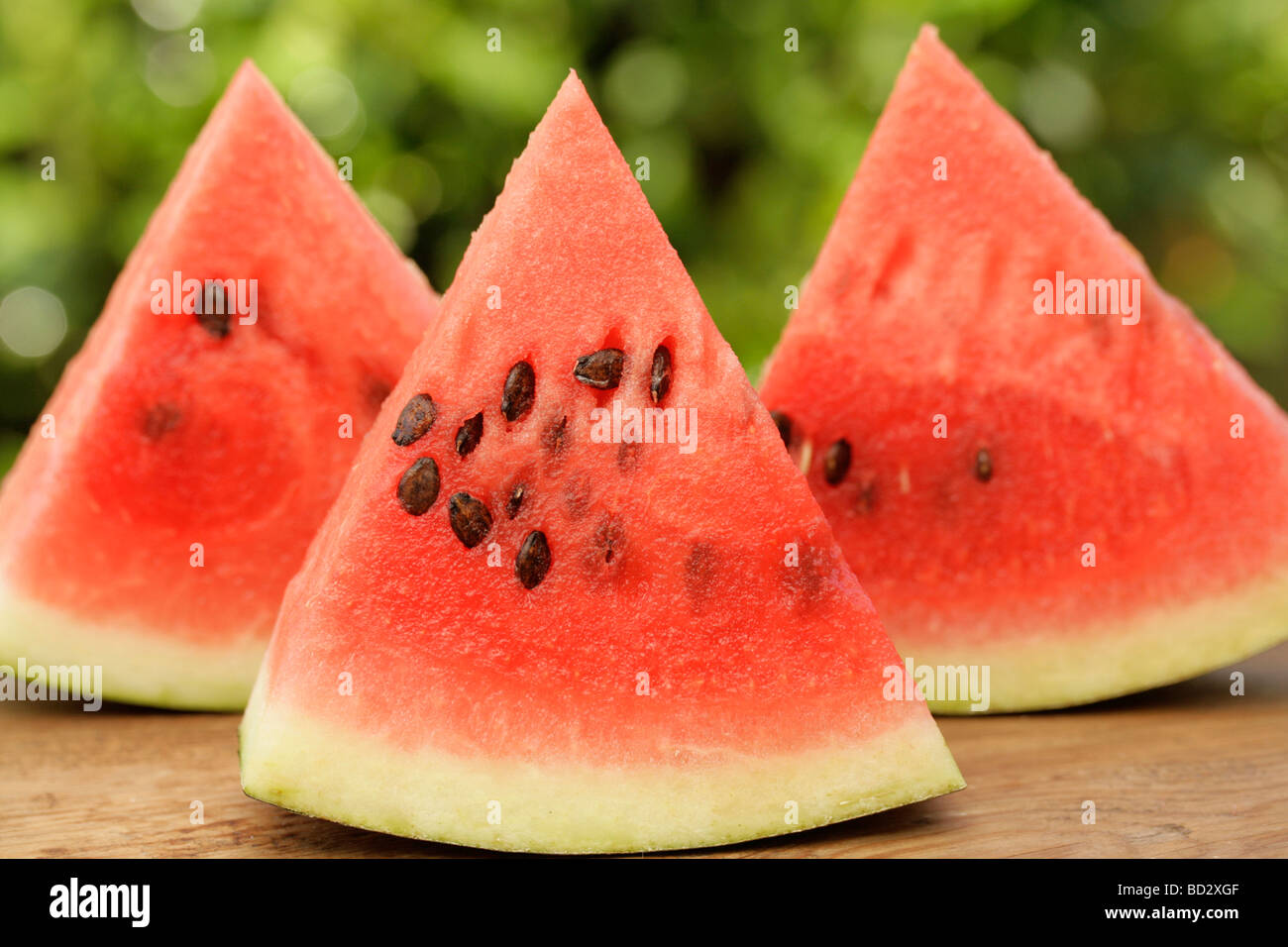 Watermelon pieces in natural background Stock Photo - Alamy